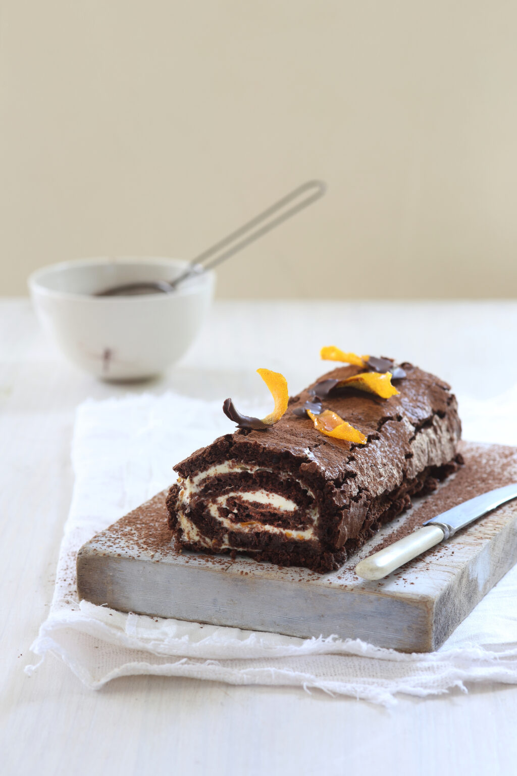 Dark Chocolate Roulade With Orange Cream And Candied Orange - NOMU